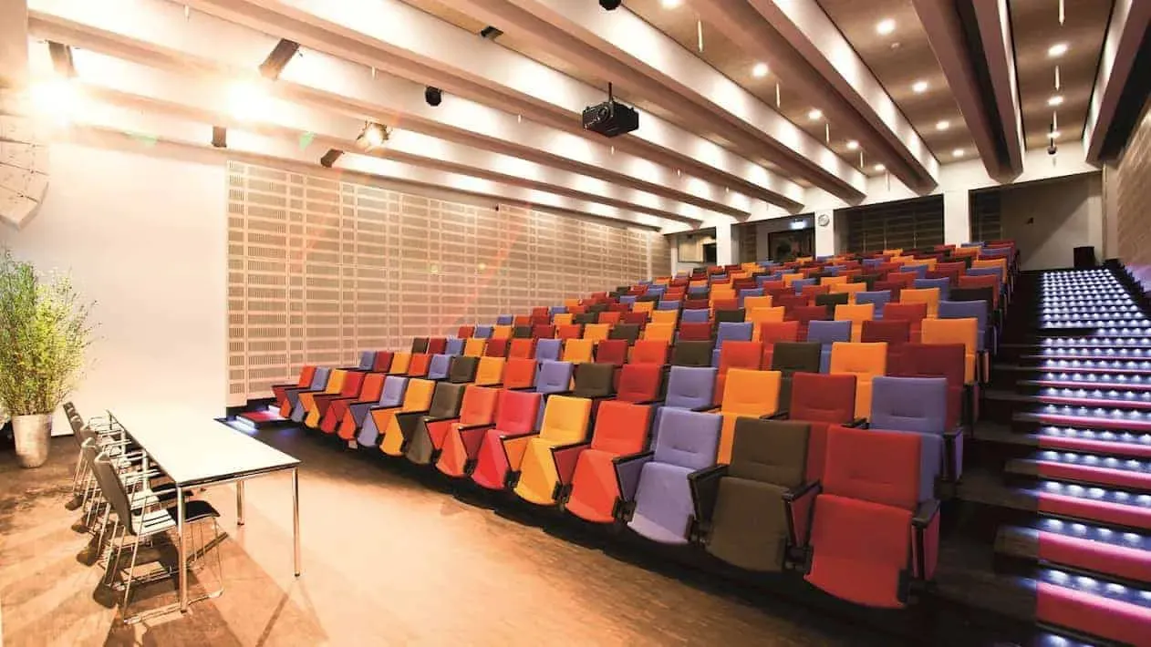 High-Tech Auditorium With Colourful Ergonomic Seating for Dynamic Events
